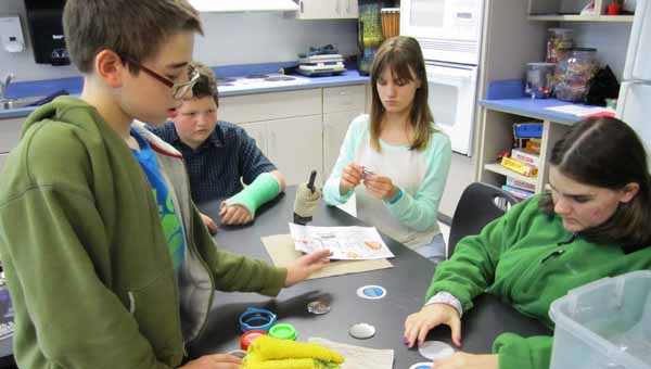 Polk County Middle School students make anti-bullying buttons - The ...